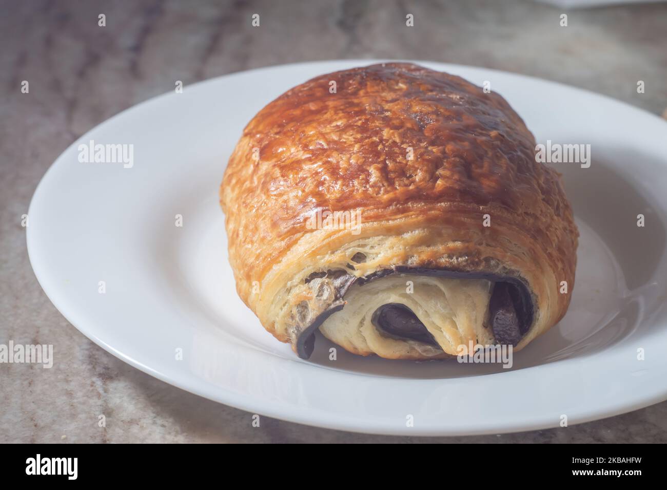 Pain au Chocolat on a white dish with natural light "chocolate bread ...