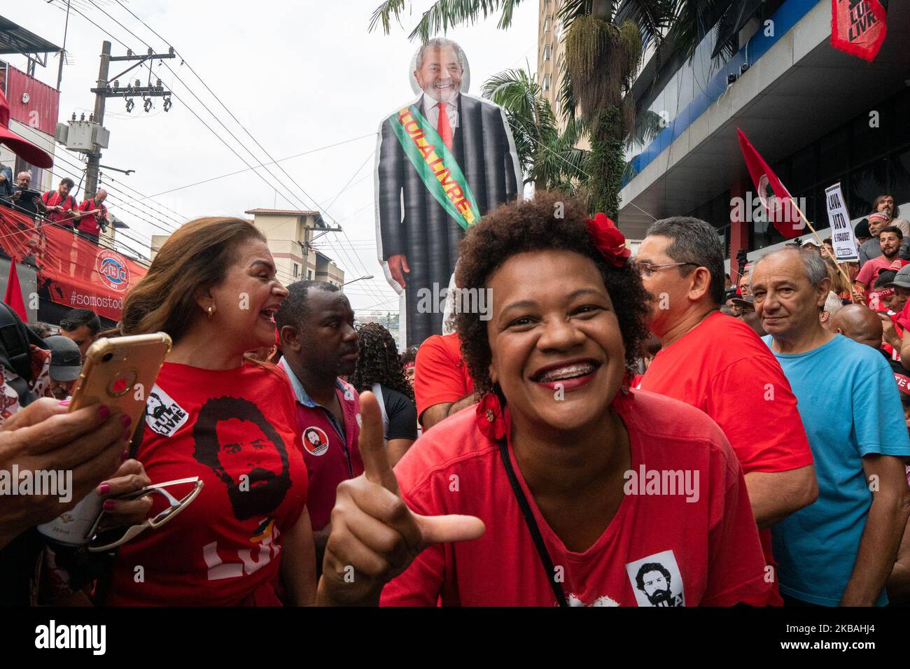 A supporter of former President Luiz Inacio Lula da Silva gestures a ...
