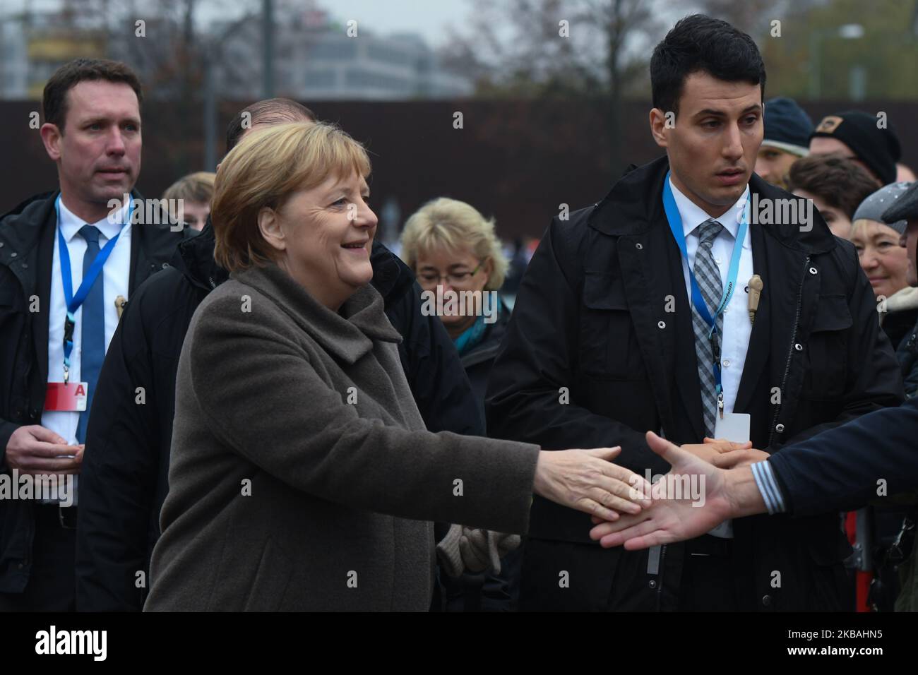 Angela Merkel (Center), Germany's Chancellor, surrounded by her ...
