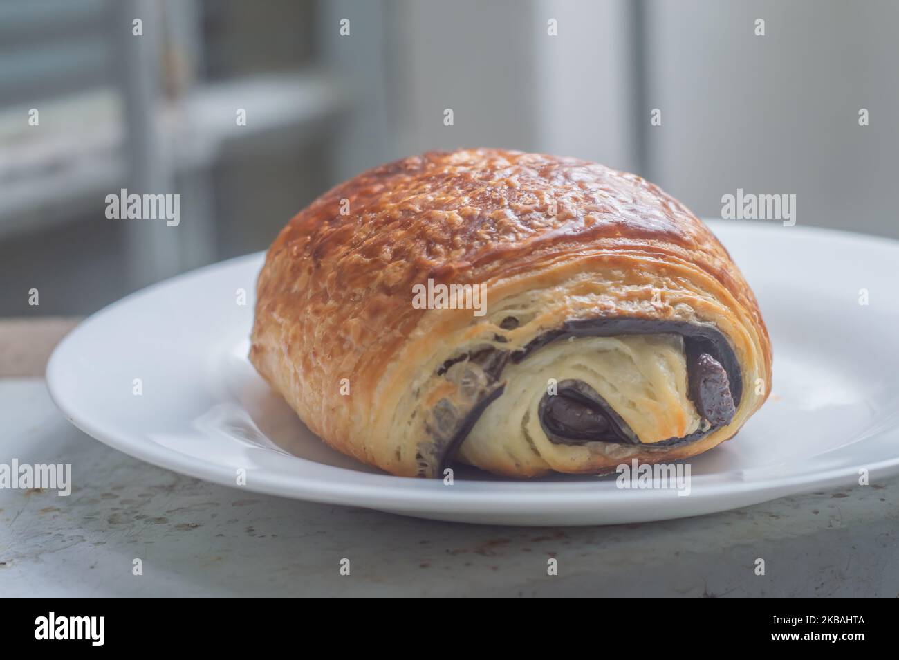 Pain au Chocolat on a white dish with natural light "chocolate bread ...
