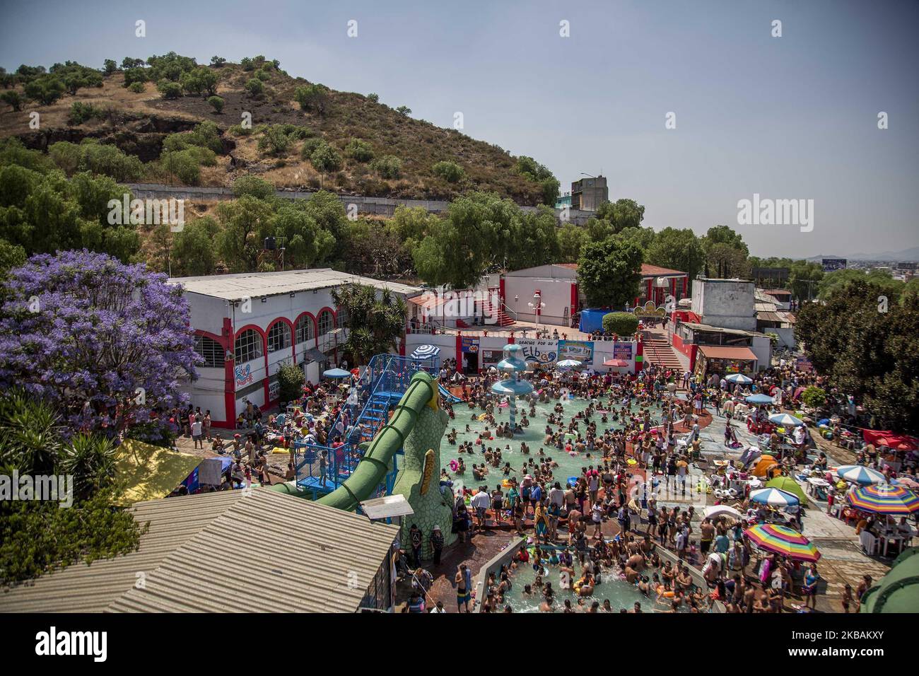 Hundreds of people attend public pools to enjoy their vacations in ...