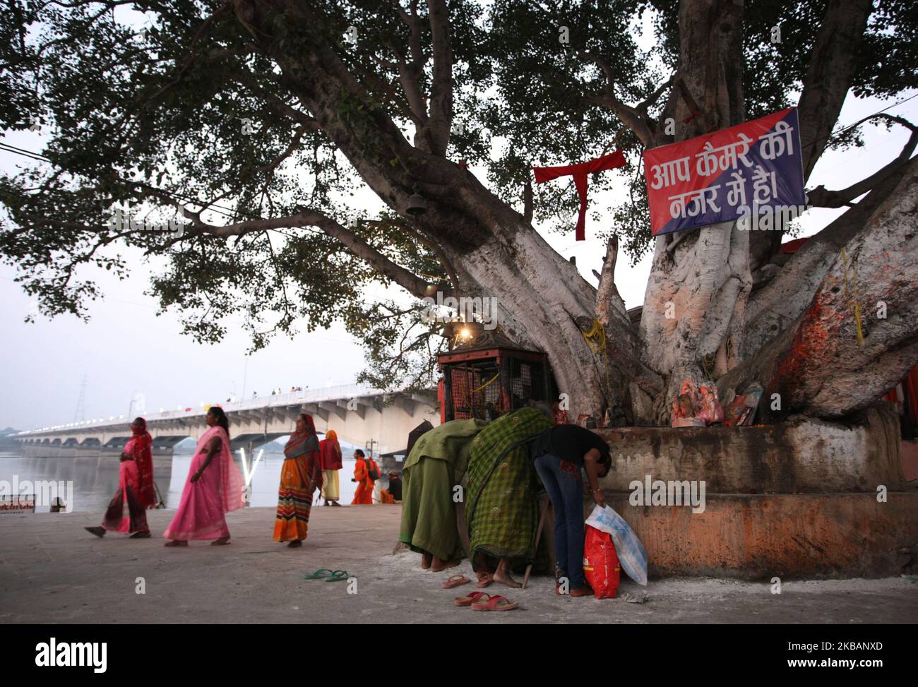 Indian devotees perform evening rituals on the banks of Saryu river in ...