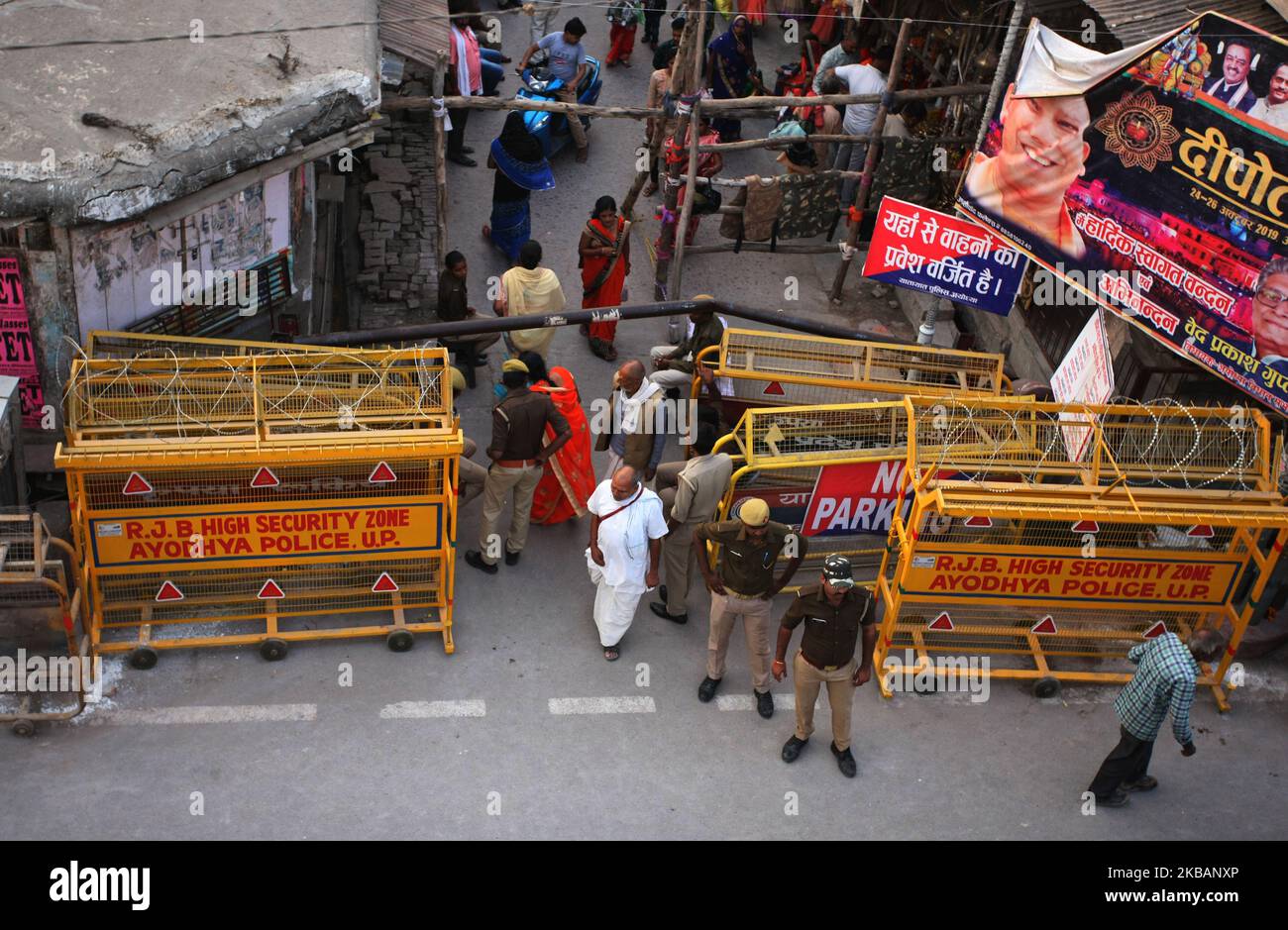 Indian devotees cross security barricades hi-res stock photography and ...