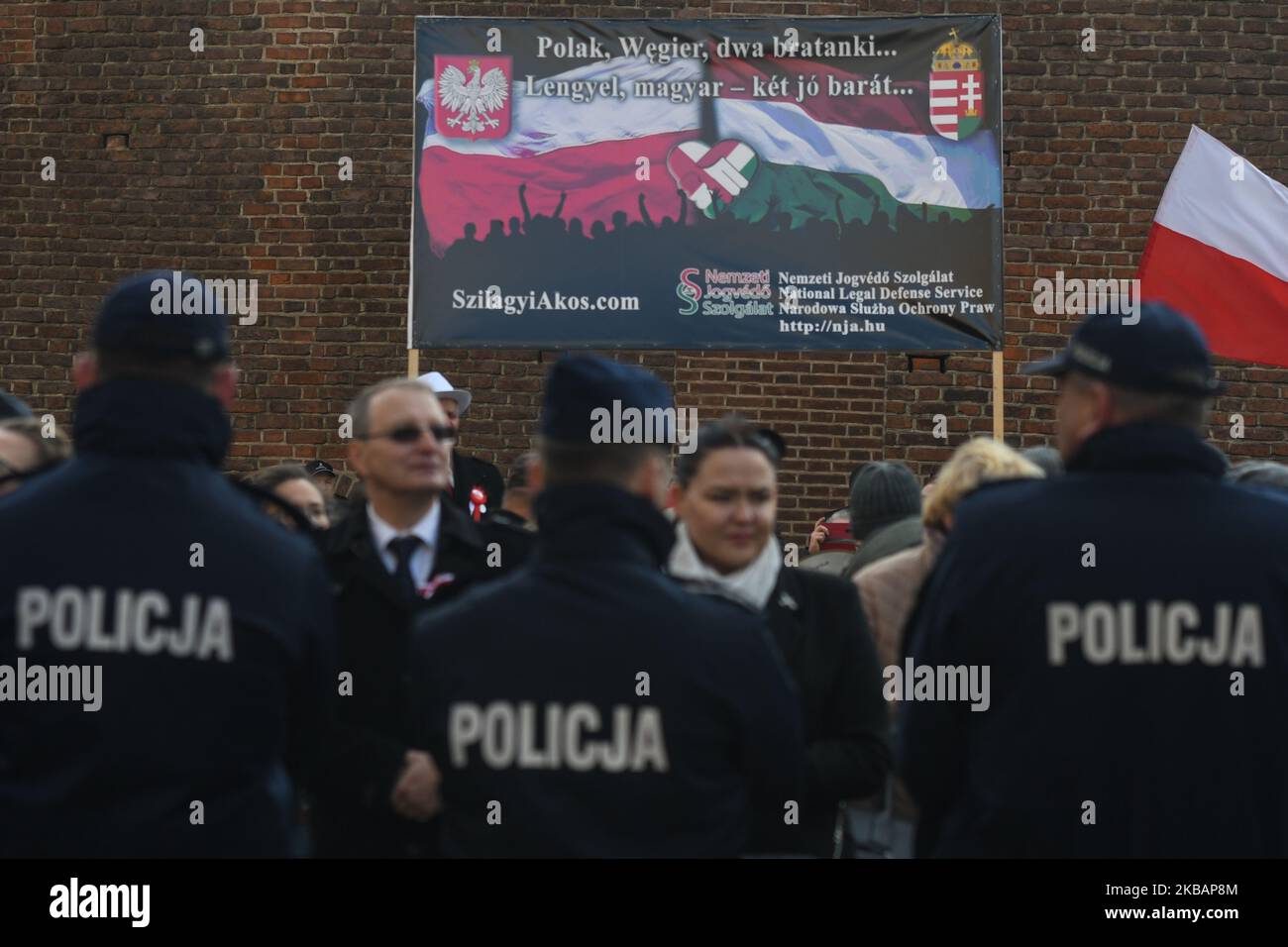 Hungarian visitors holds 'Pole, Hungarian, two best friends...' banner ...