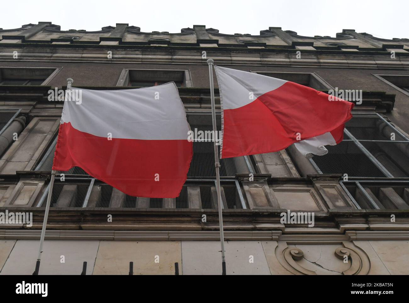 Polish national flags attached to the facade of to the Administrative ...