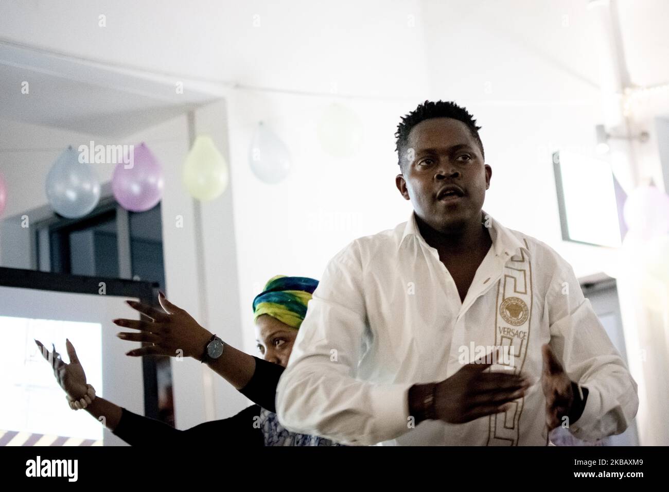 People danced to traditional African rhythms during the African ...