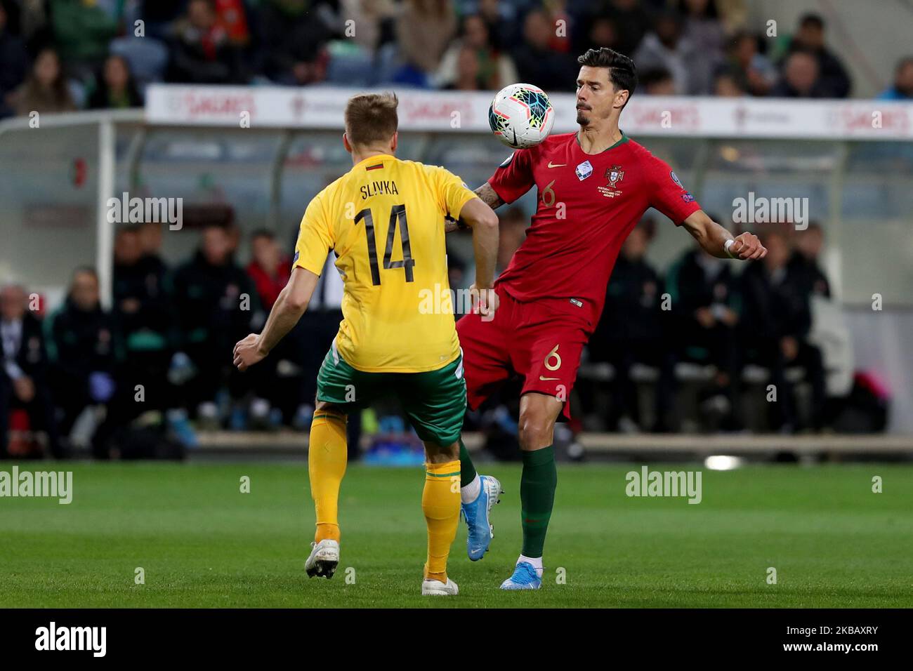 Portugal's defender Jose Fonte (R ) vies with Lithuania's midfielder ...