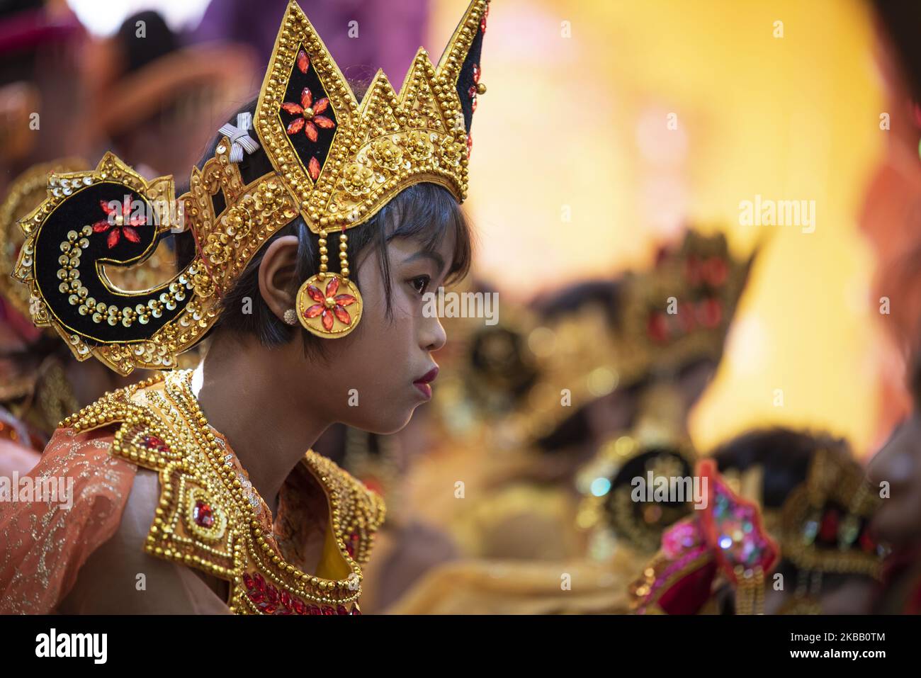 A girl dresses like Bagan princess waits before taking part in a parade ...