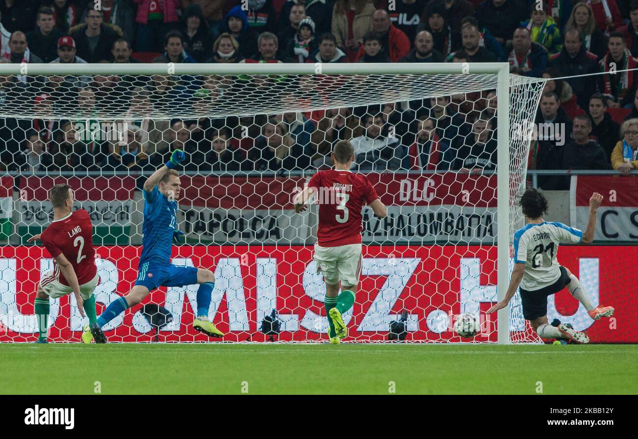 Edinson Cavani of Uruguay shots the first goal during the Hungary and ...