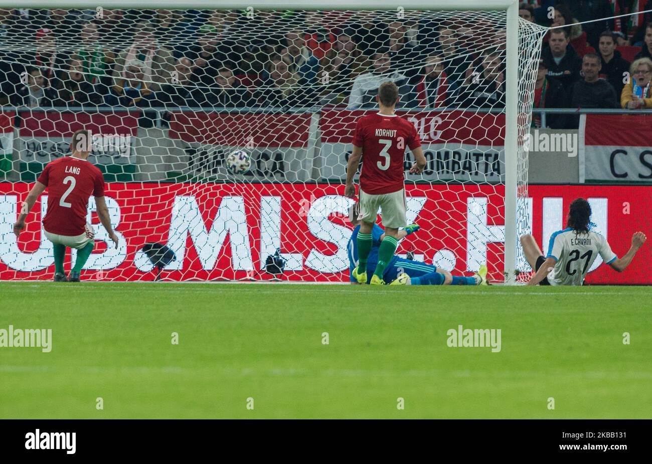 Edinson Cavani of Uruguay shots the first goal during the Hungary and ...