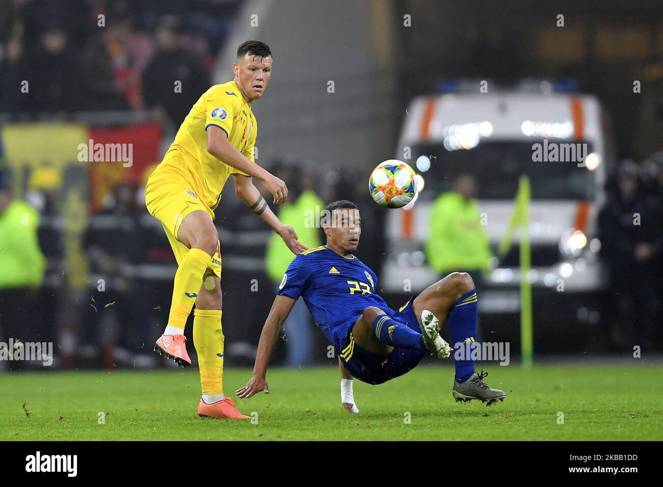 Robin Quaison of Sweden in action against Adrian Rus of Romaniaduring ...