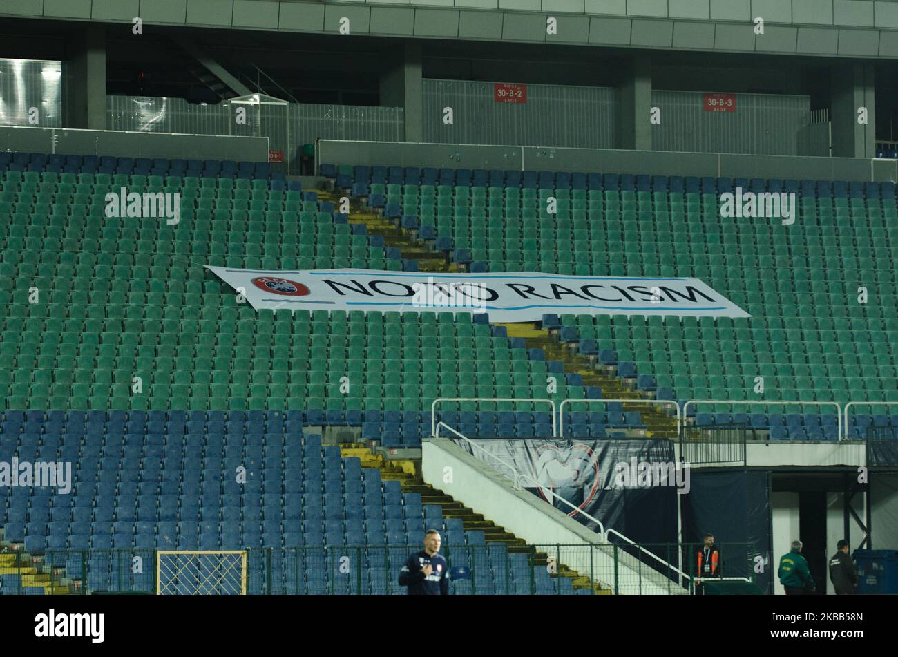 A banner reading 'No to racism' is displayed on the tribune prior to ...