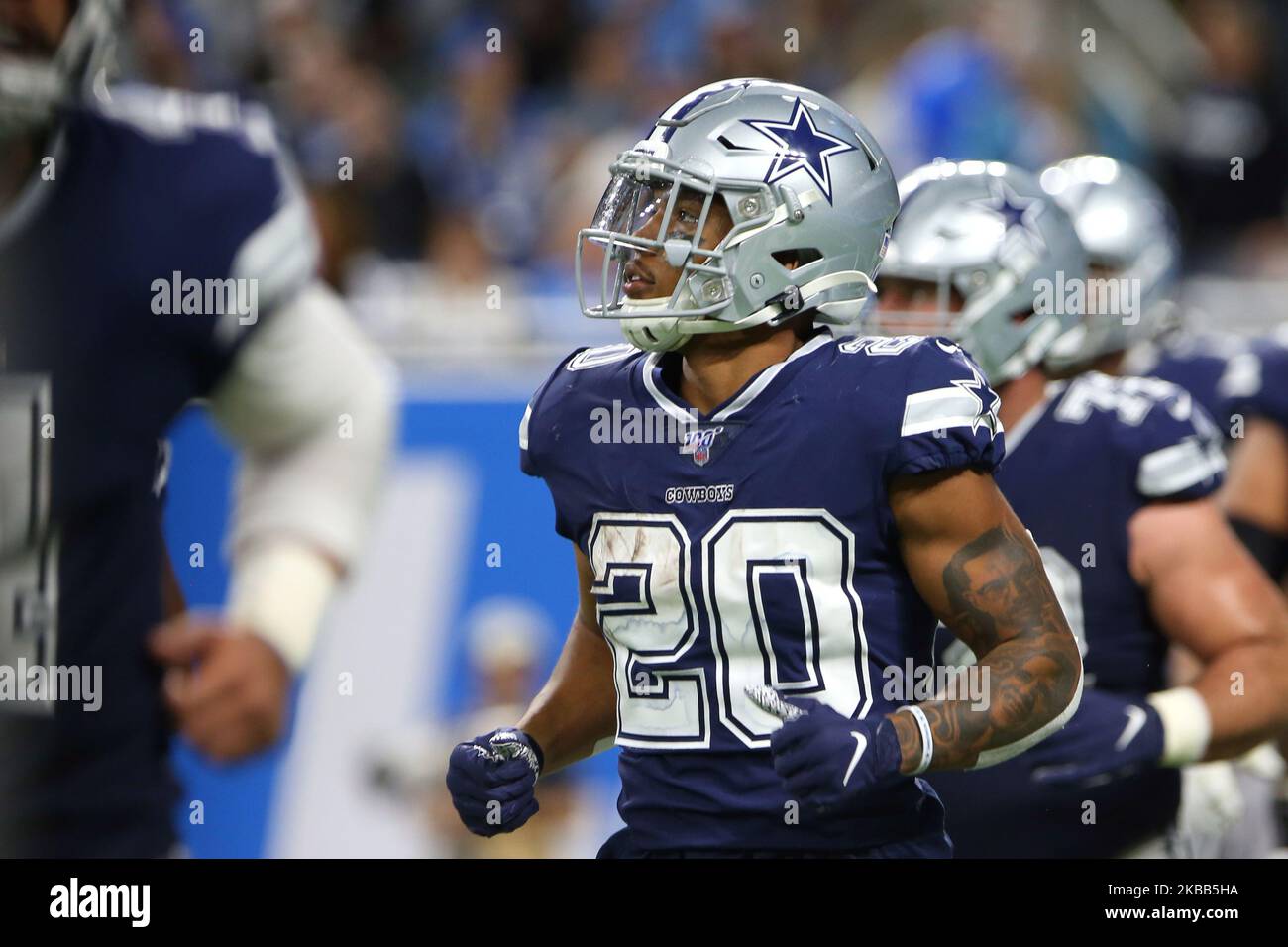 Dallas Cowboys running back Tony Pollard (20) heads to the bench after ...