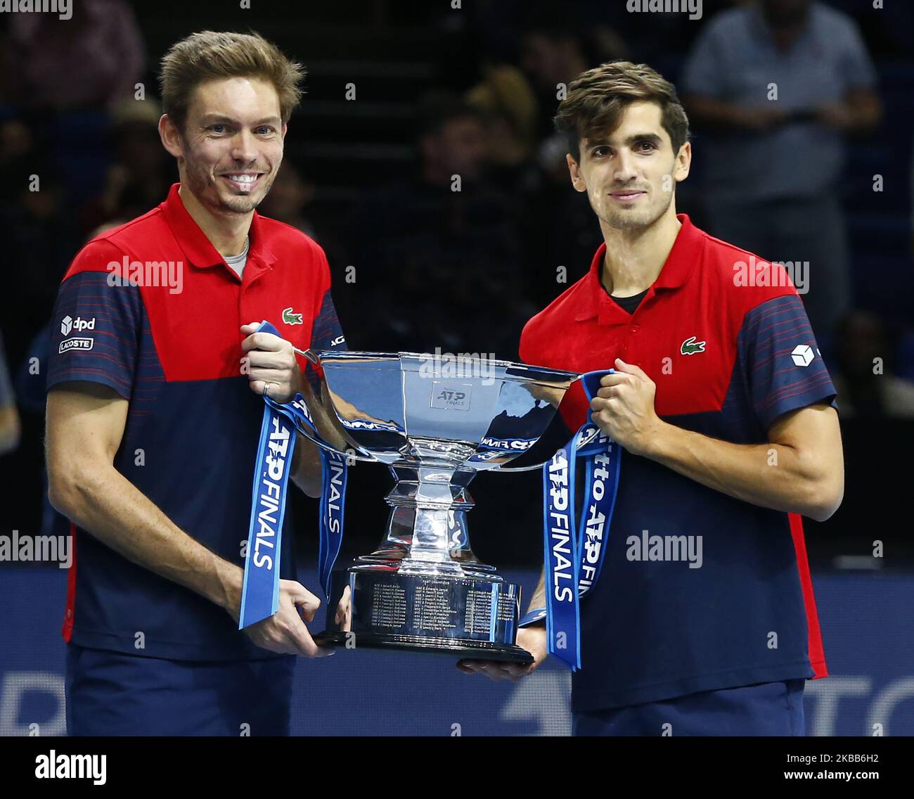 Nicolas Mahut and Pierre-Hugues Herbert of France (winners) pose with ...