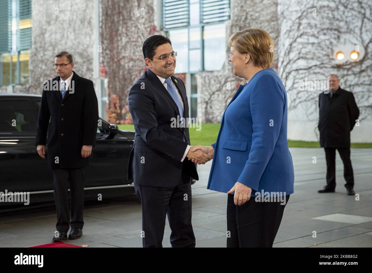 German Chancellor Angela Merkel greets Morocco's Foreign Minister ...
