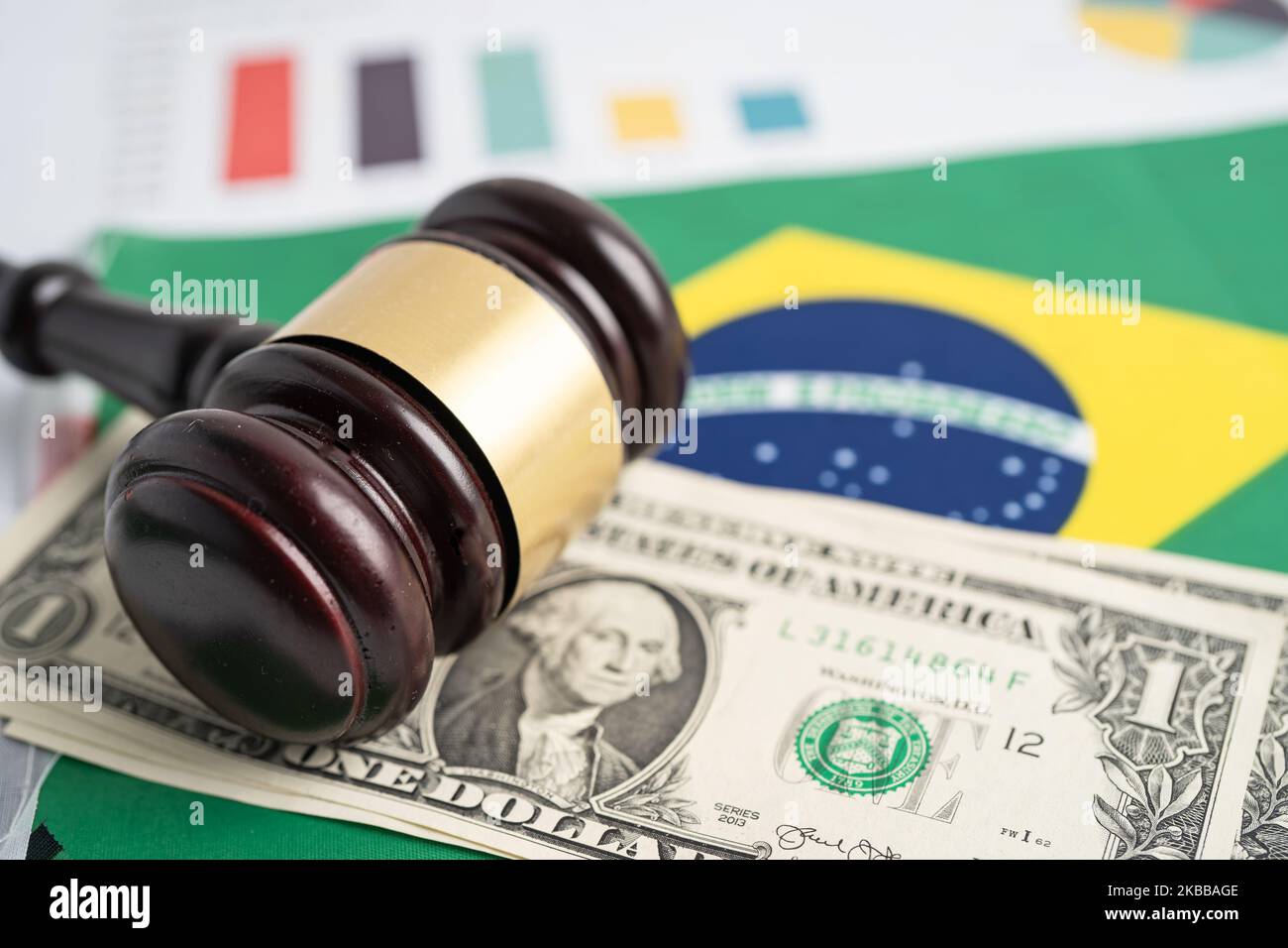 Gavel on Brazil flag with graph and US dollar banknotes for judge ...