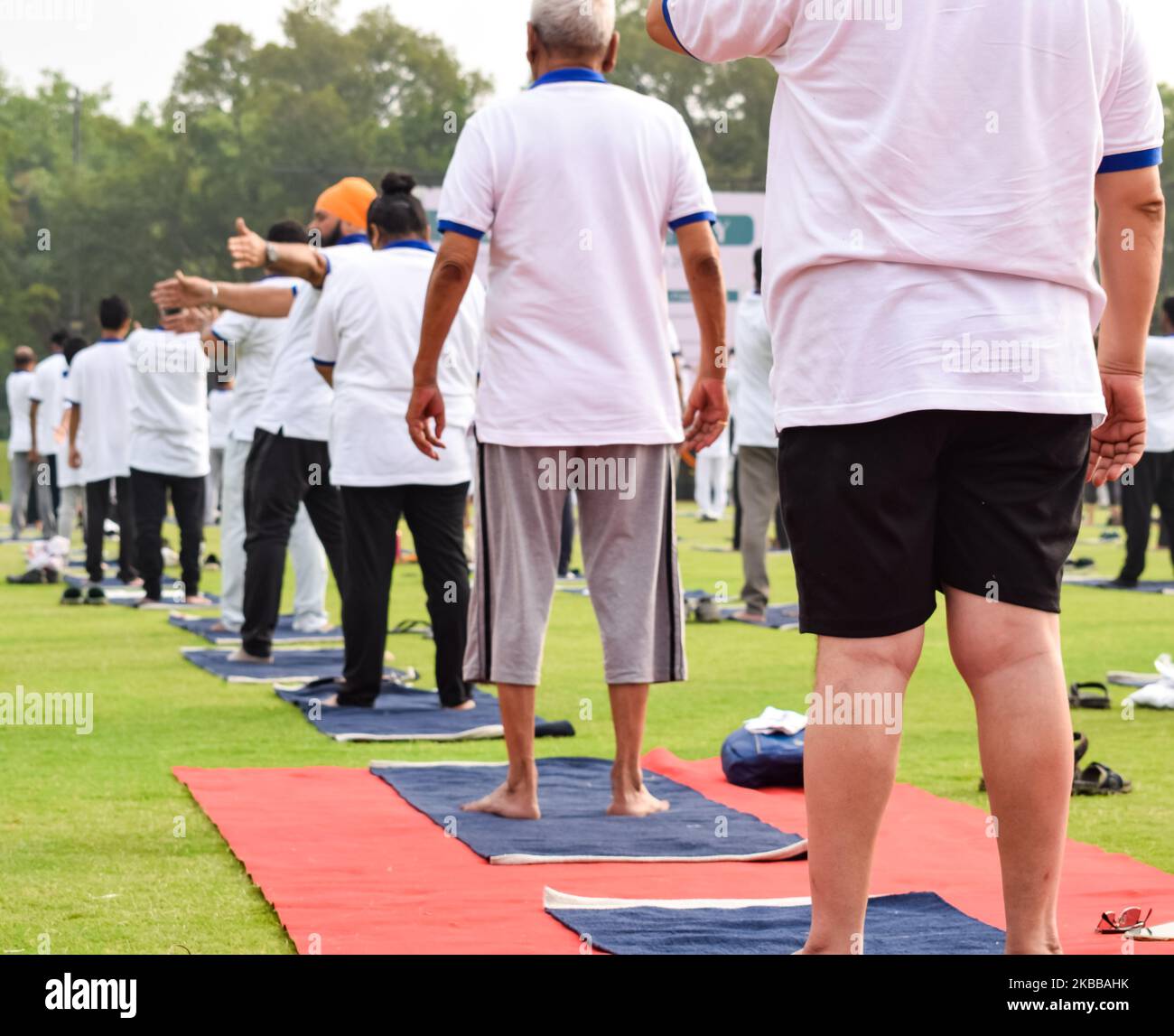 Group Yoga exercise session for people of different age groups at ...