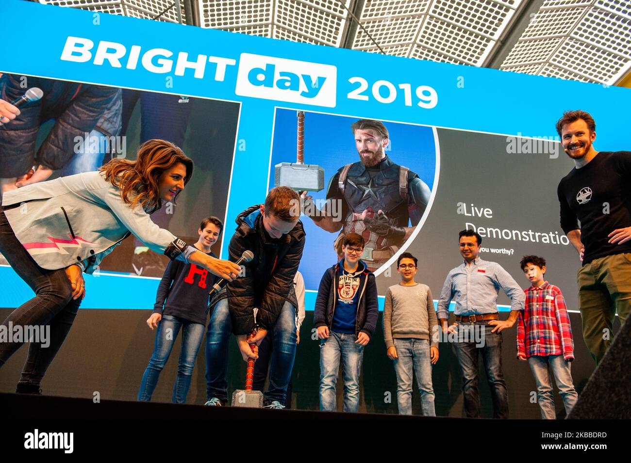 Some kids trying to move the Thor's hammer during a live demonstration ...