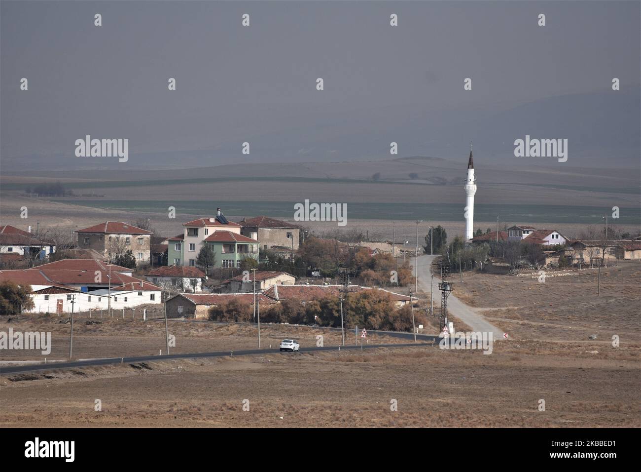 A car drives past a small village in Polatli district, some 80 ...