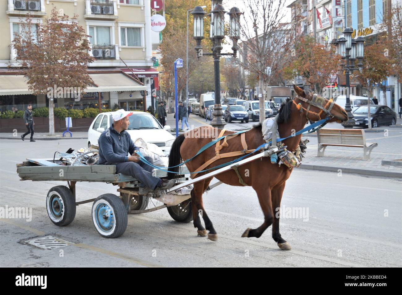 A man rides a horse with a cart in Polatli district, some 80 kilometres ...