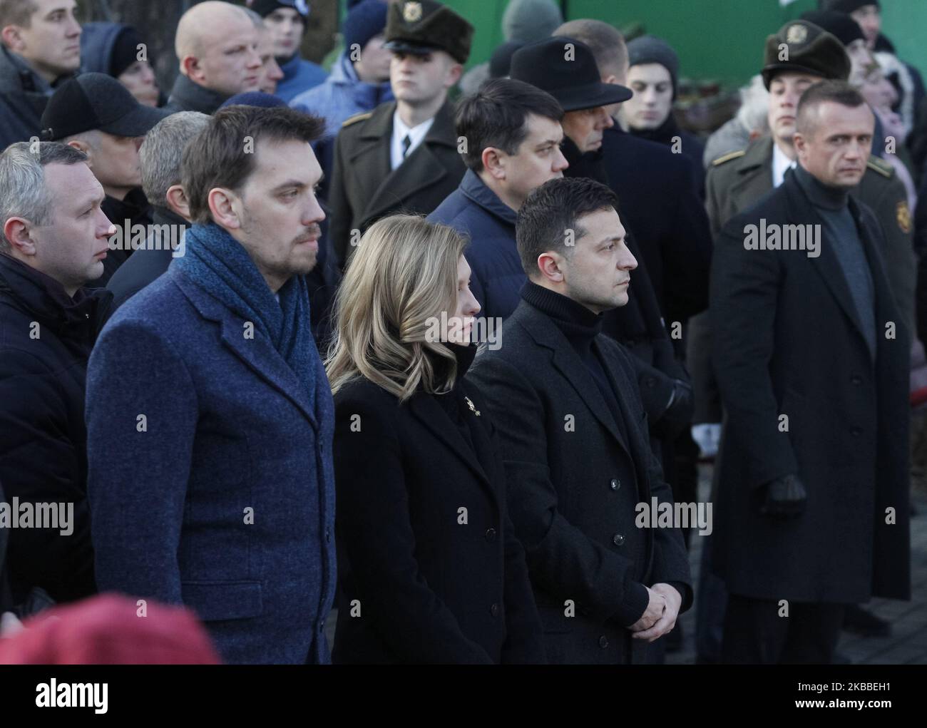 Ukrainian President Volodymyr Zelensky (C) his wife Olena (3-L) and ...