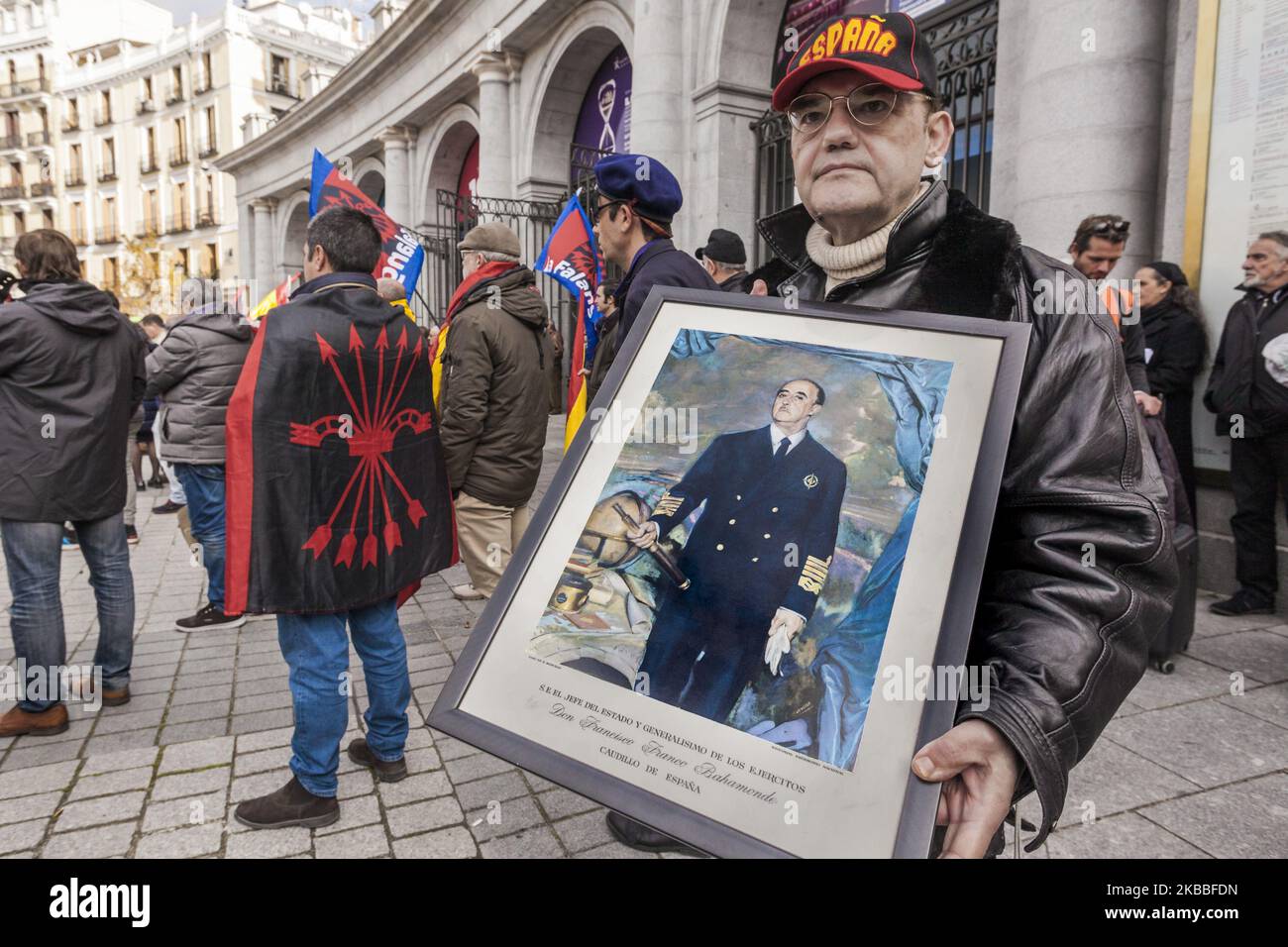 A person holds a photo of the spanish dictator Francisco Franco in a ...