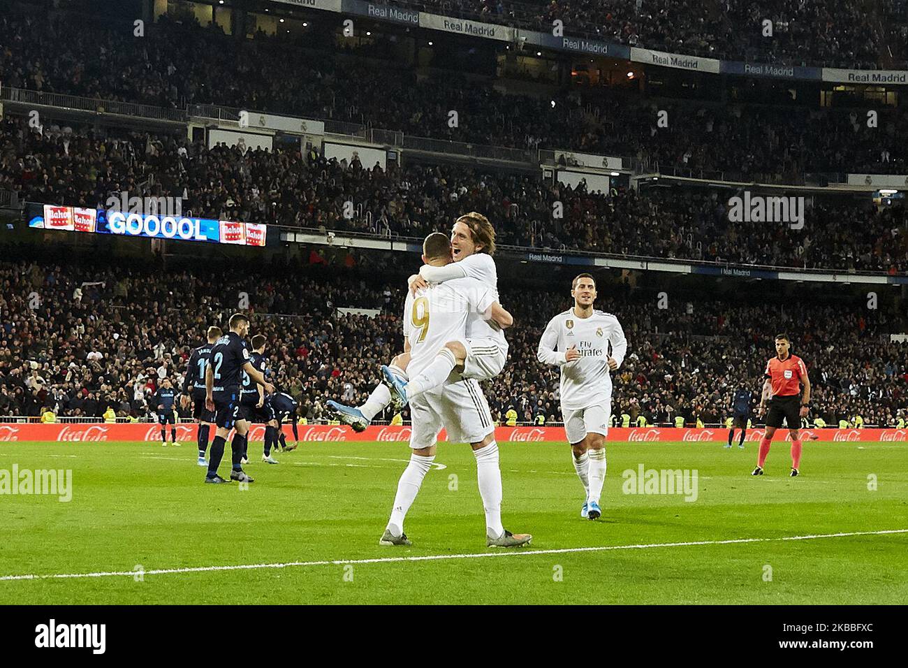 Karim Benzema and Luka Modric of Real Madrid celebrate goal during La ...