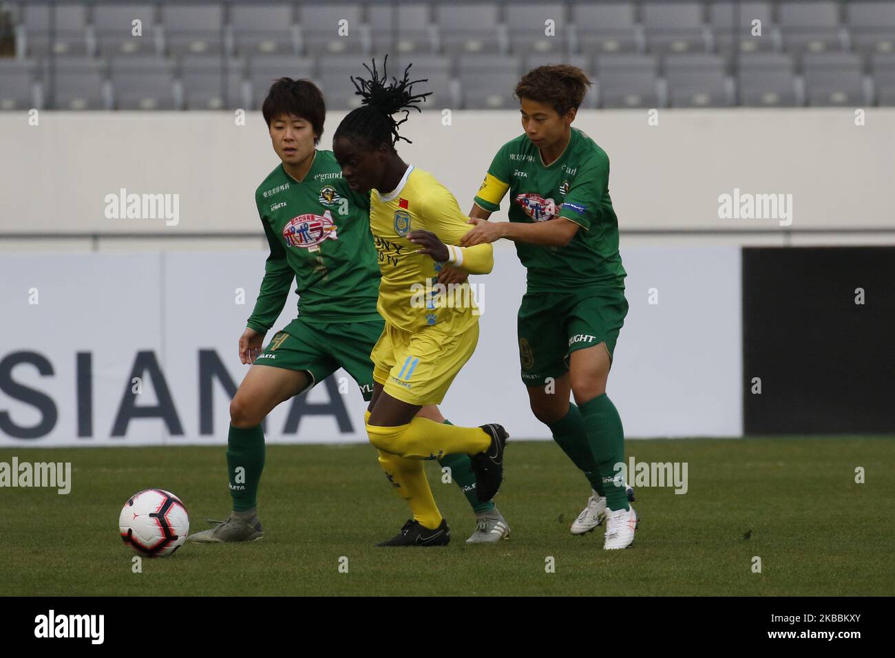 Mina Talaka of Nippon TV Beleza and Tabitha Chawinga of Jiangsu Suning Ladies Football Club ...