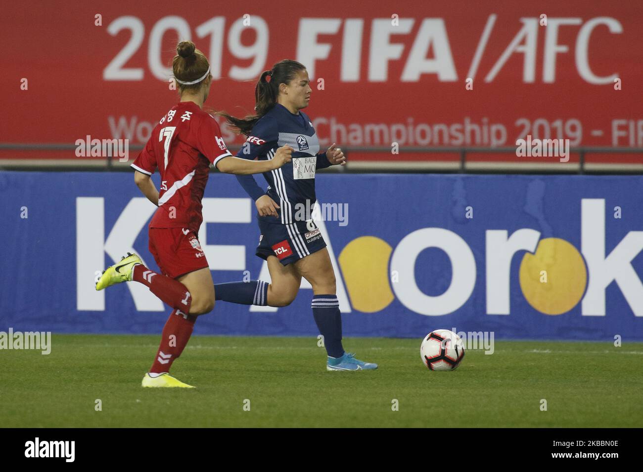 Angela Beard of Melbourne Victory and Lee Young Ju of Incheon Hyundai Steel Red Angels action ...