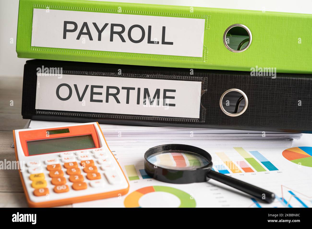 Payroll and Overtime. Binder data finance report business with graph ...
