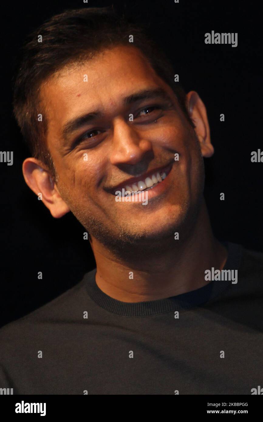 Indian cricketer Mahendra Singh Dhoni smiles during the promotional ...