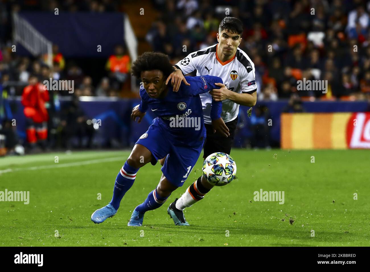 Willian Borges da Silva of Chelsea FC and Carlos Soler of Valencia CF ...