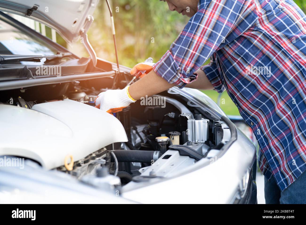 Open hood mechanic engine system to check and repair damage car crash ...