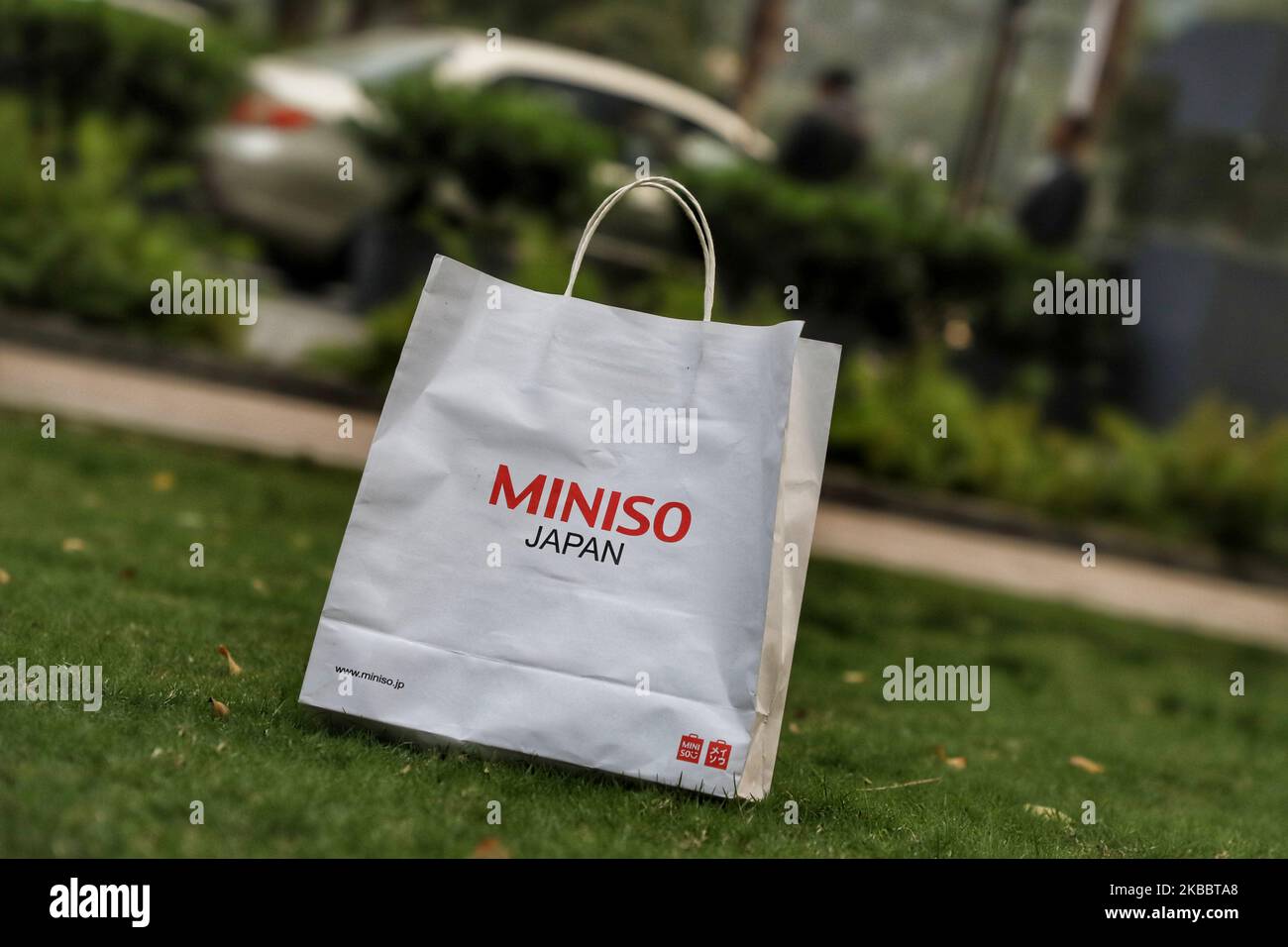 A Carry bag of Miniso lies in a park in New Delhi India on 28 November ...