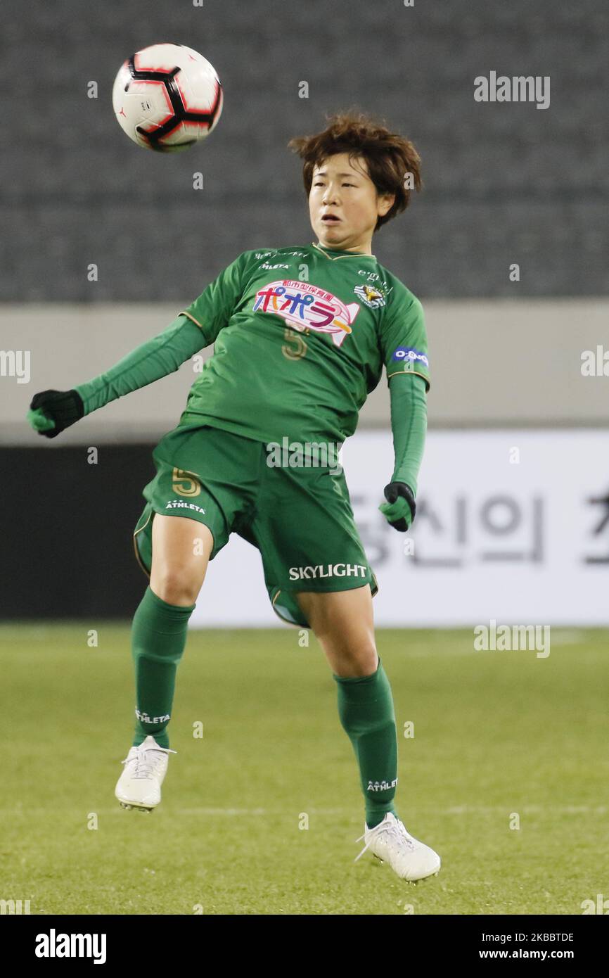 Asato Miyagawa of Nippon TV Belaza of Japan controls the ball during an Women's Club ...