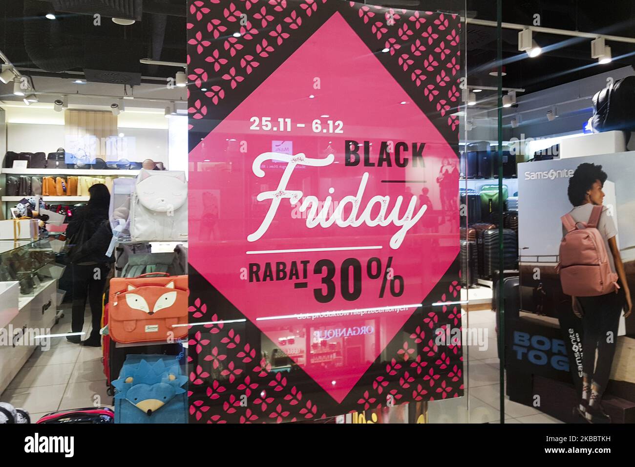 Black Friday signs are displayed at shop windows on the eve of Black ...