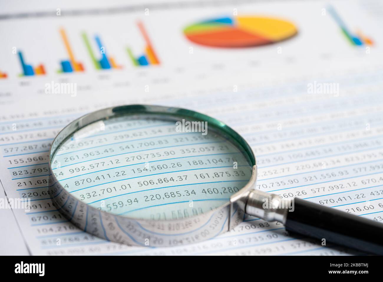 Magnifying glass on bar chart hi-res stock photography and images - Alamy