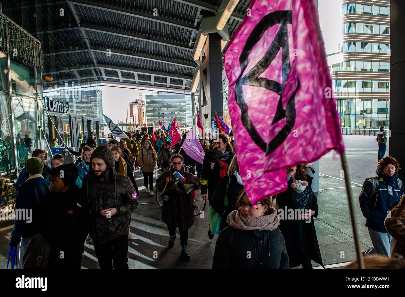 XR activists are walking around the Central train station on their way ...