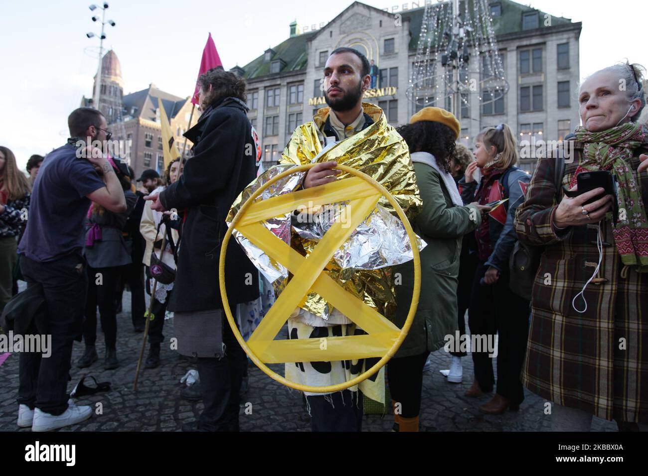 Extinction Rebellion activists perform during ‘Black Friday Rebellion ...