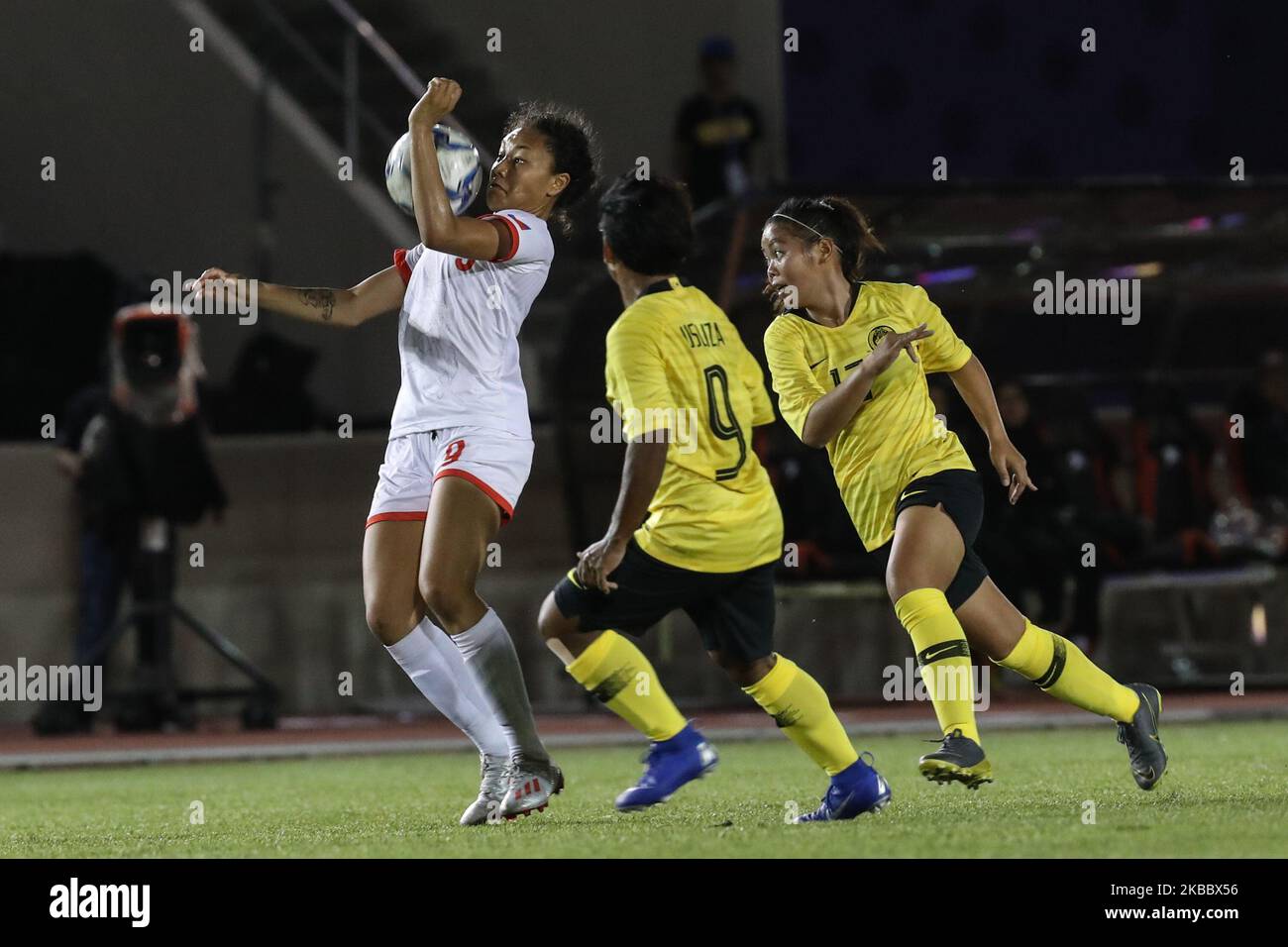 Sarina Isabel Bolden (in white) of the Philippines receives the ball ...