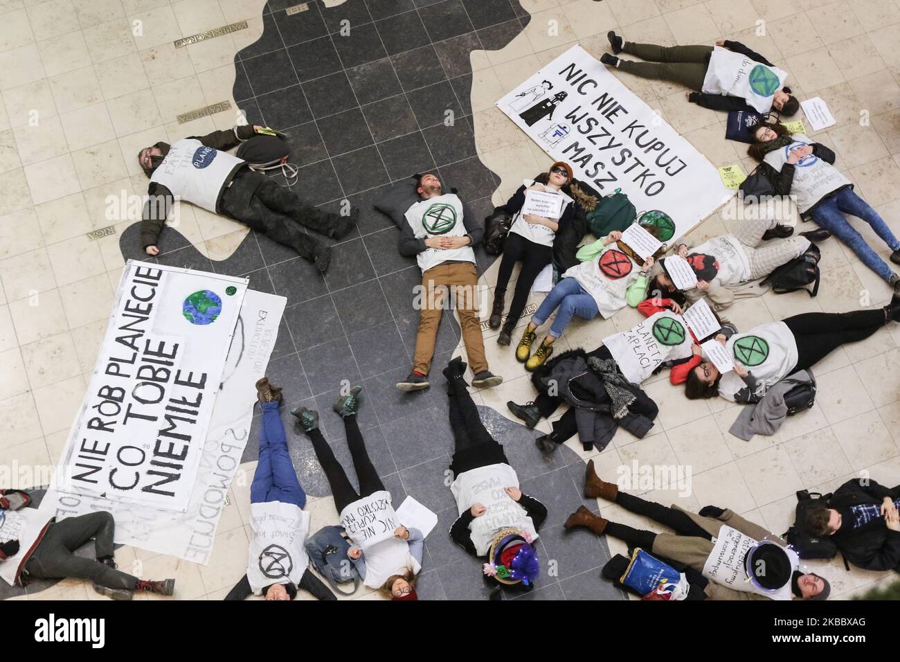 Extinction Rebellion members with banner that speaks ' What you do not ...