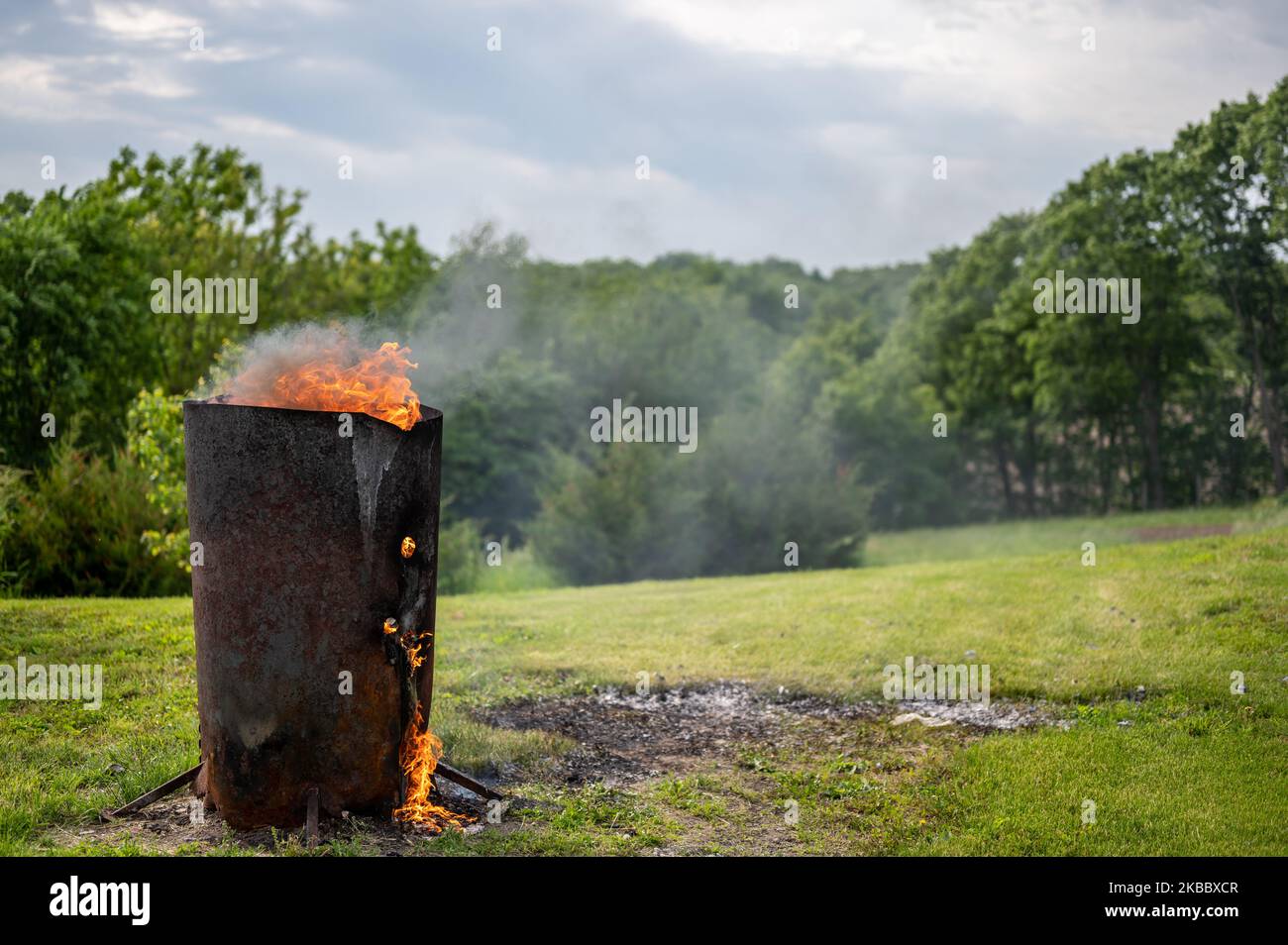 Burn barrel in a rural area used to incinerate trash and garbage Stock ...