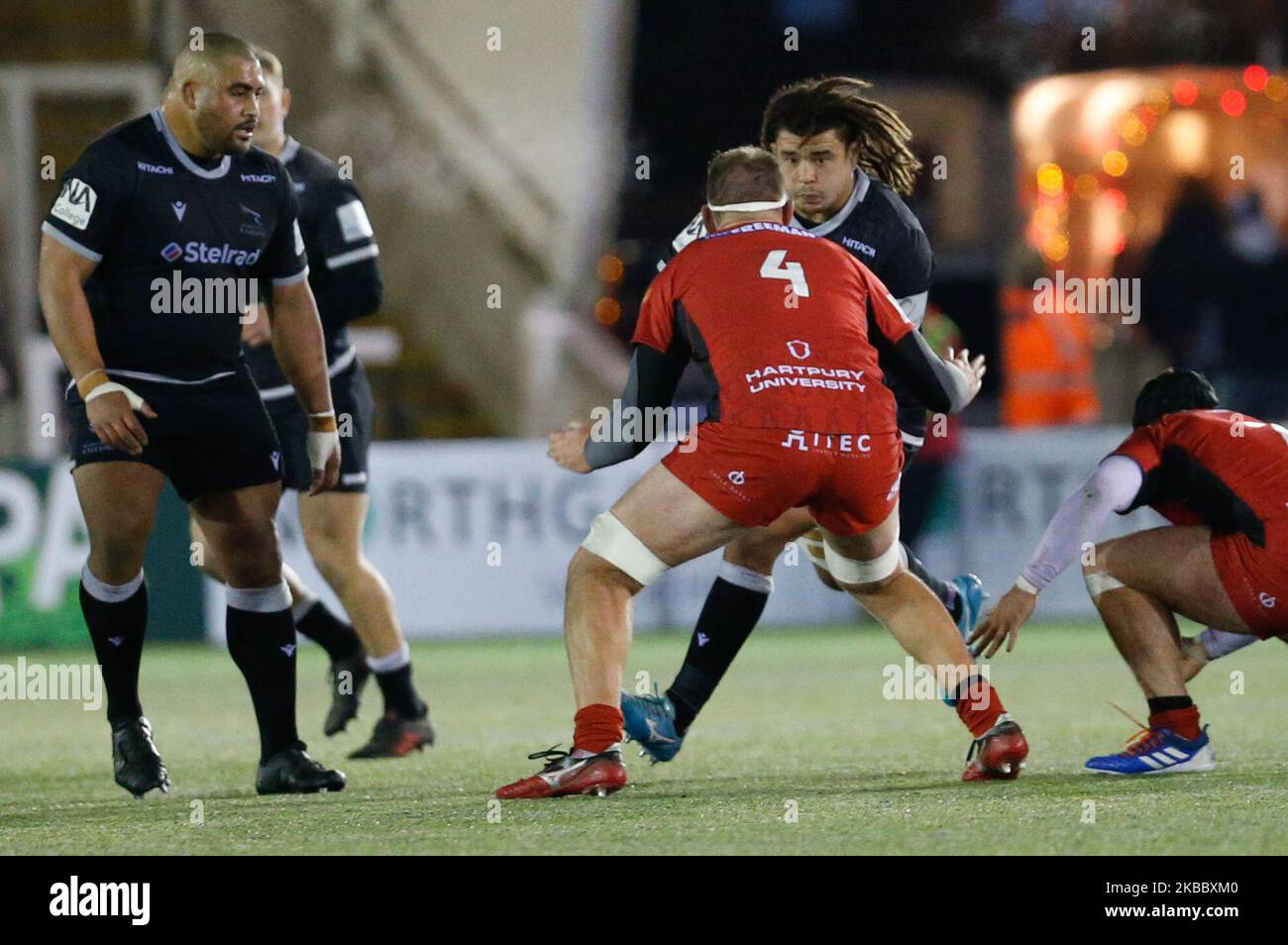 Sam Lockwood of Newcastle Falcons looks to take on Joe Batley of ...
