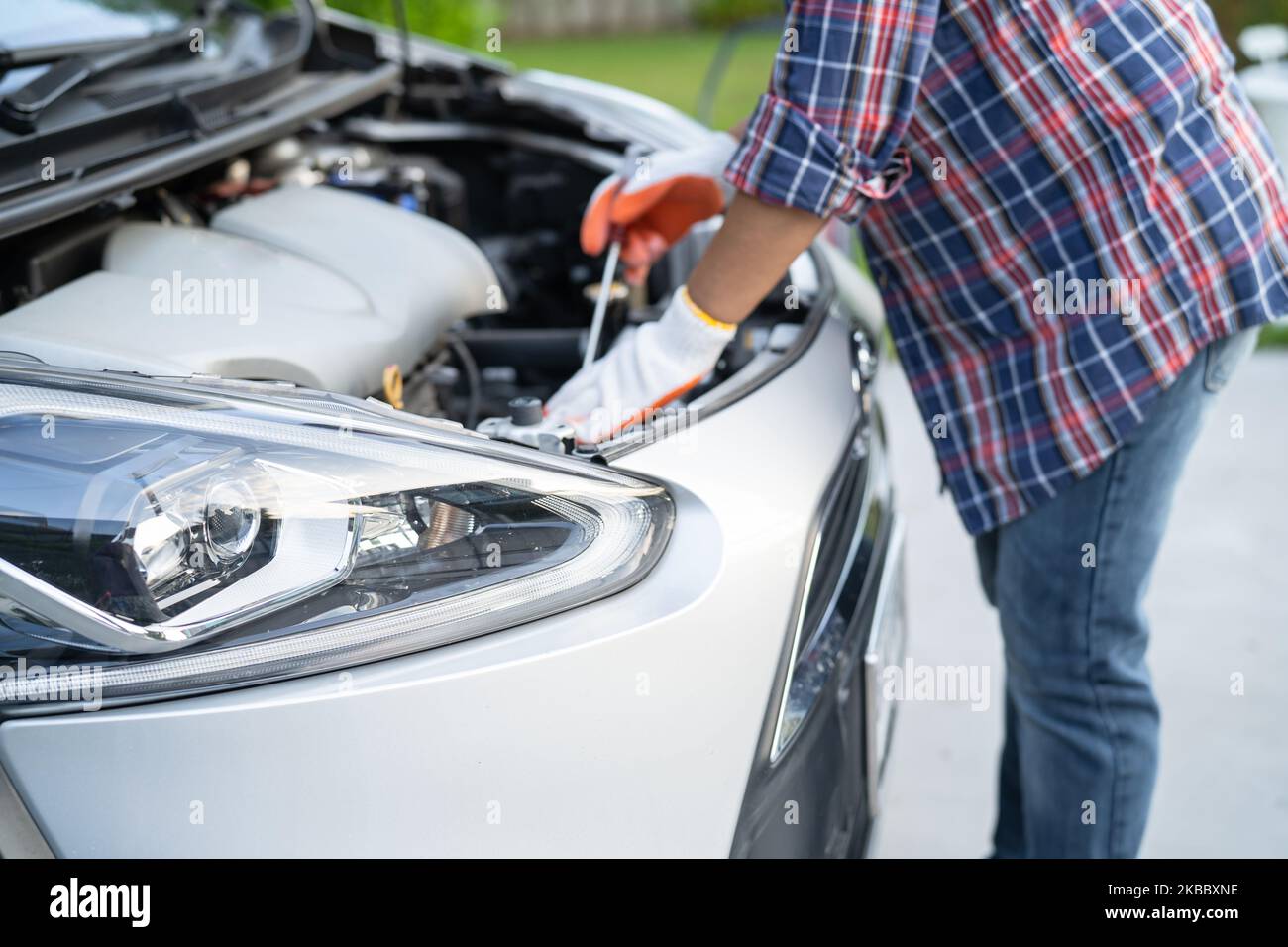 Open hood mechanic engine system to check and repair damage car crash ...