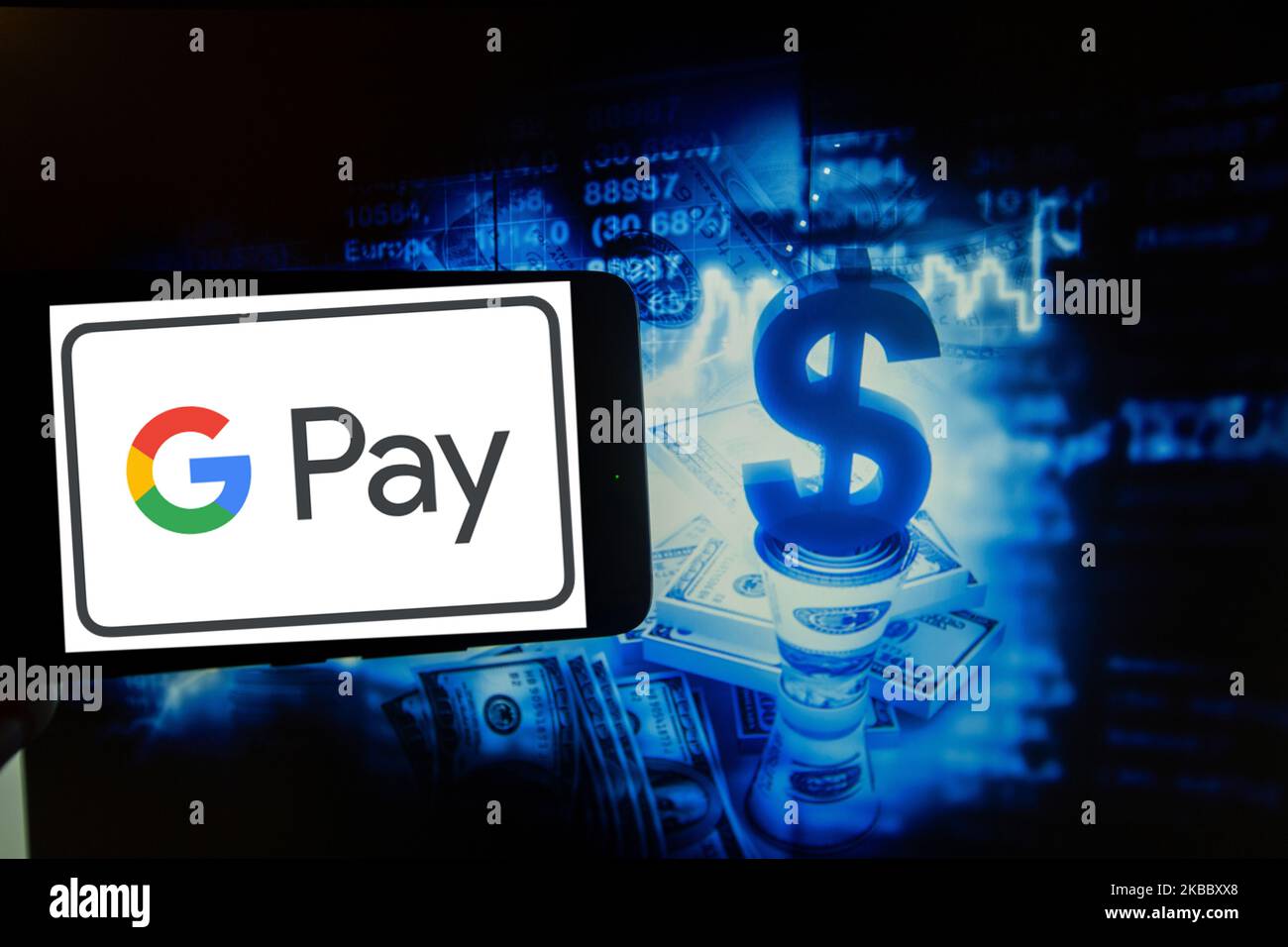 The logo of Google Pay is seen on a screen next to an illustration of ...