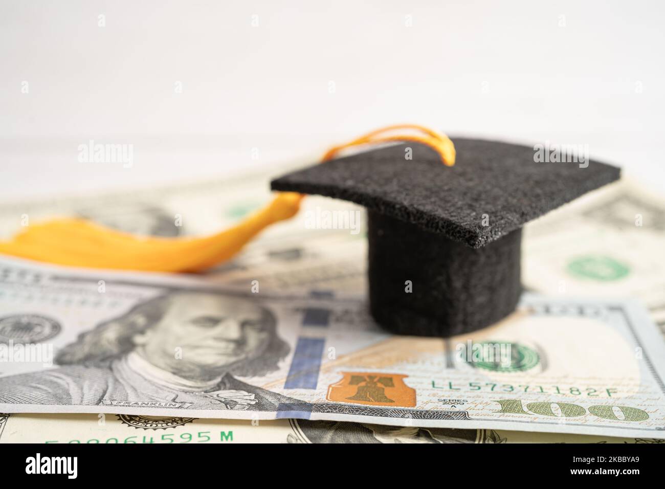 Graduation gap hat on US dollar banknotes money, Education study fee ...