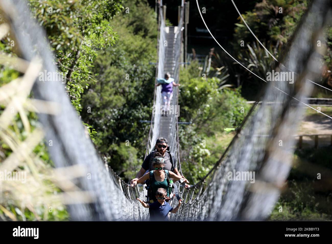 Visitors crossa buller gorge swingbridge hi-res stock photography and ...