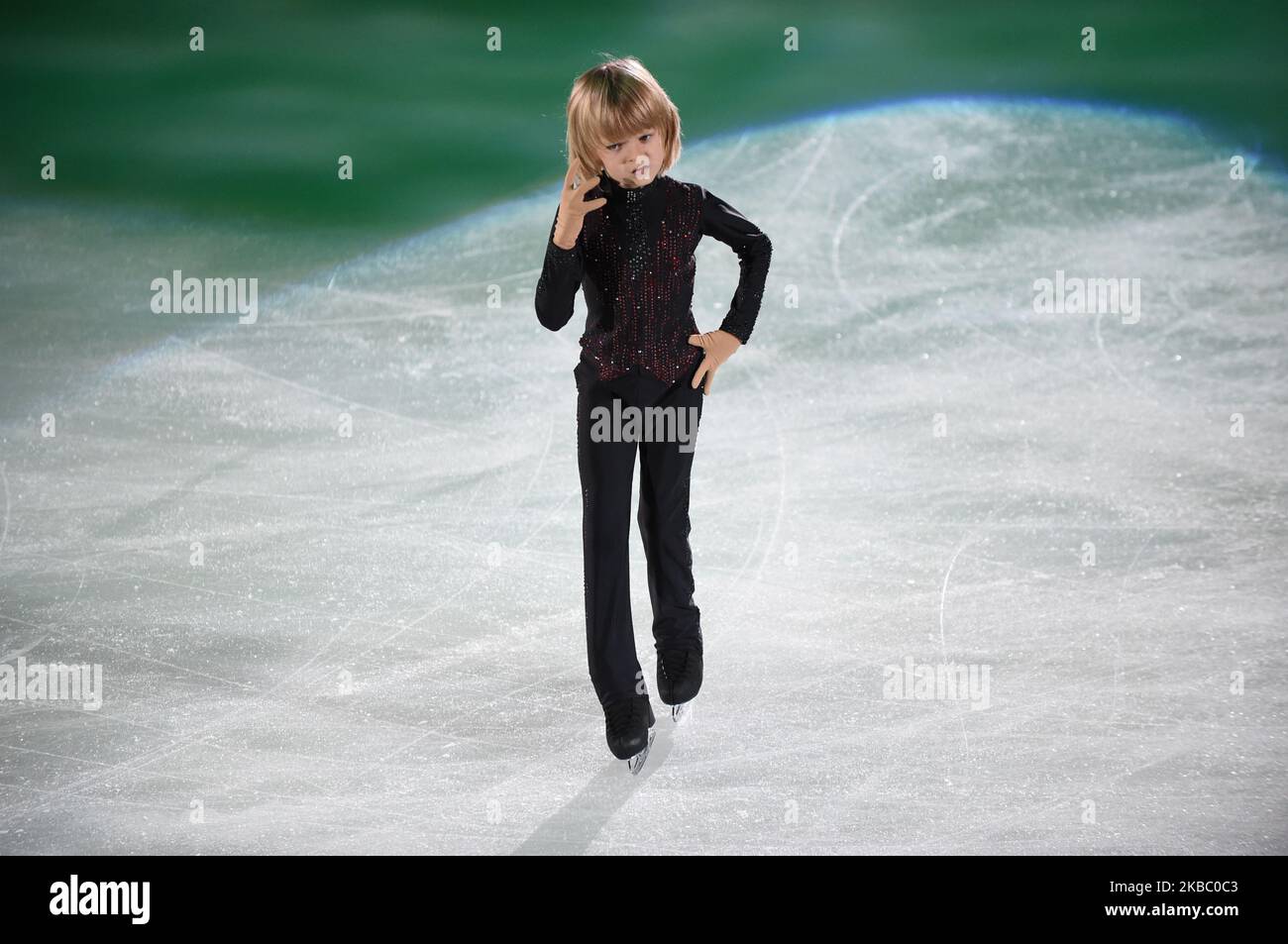 Russian skaters Evgini Plushenko and his son Alexander skating during ...