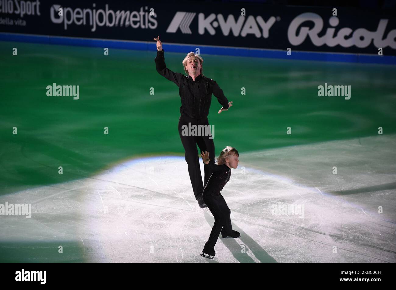 Russian skaters Evgini Plushenko and his son Alexander skating during ...
