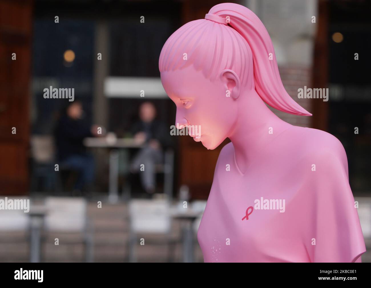 People watch a 3D printed statue of the Dutch AIDS Foundation at the ...